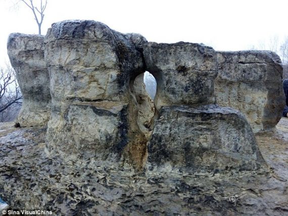 UFO-Shaped Rock Discovered on Mountain in China